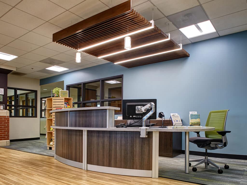 Green Hills Multi-Height Circulation Desk - Library Furniture International